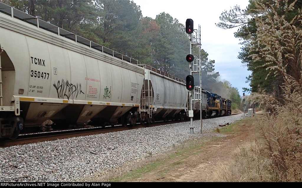 CSX C40-8W’s 7785 and 7838, and B40-8 5941, hustle covered hoppers